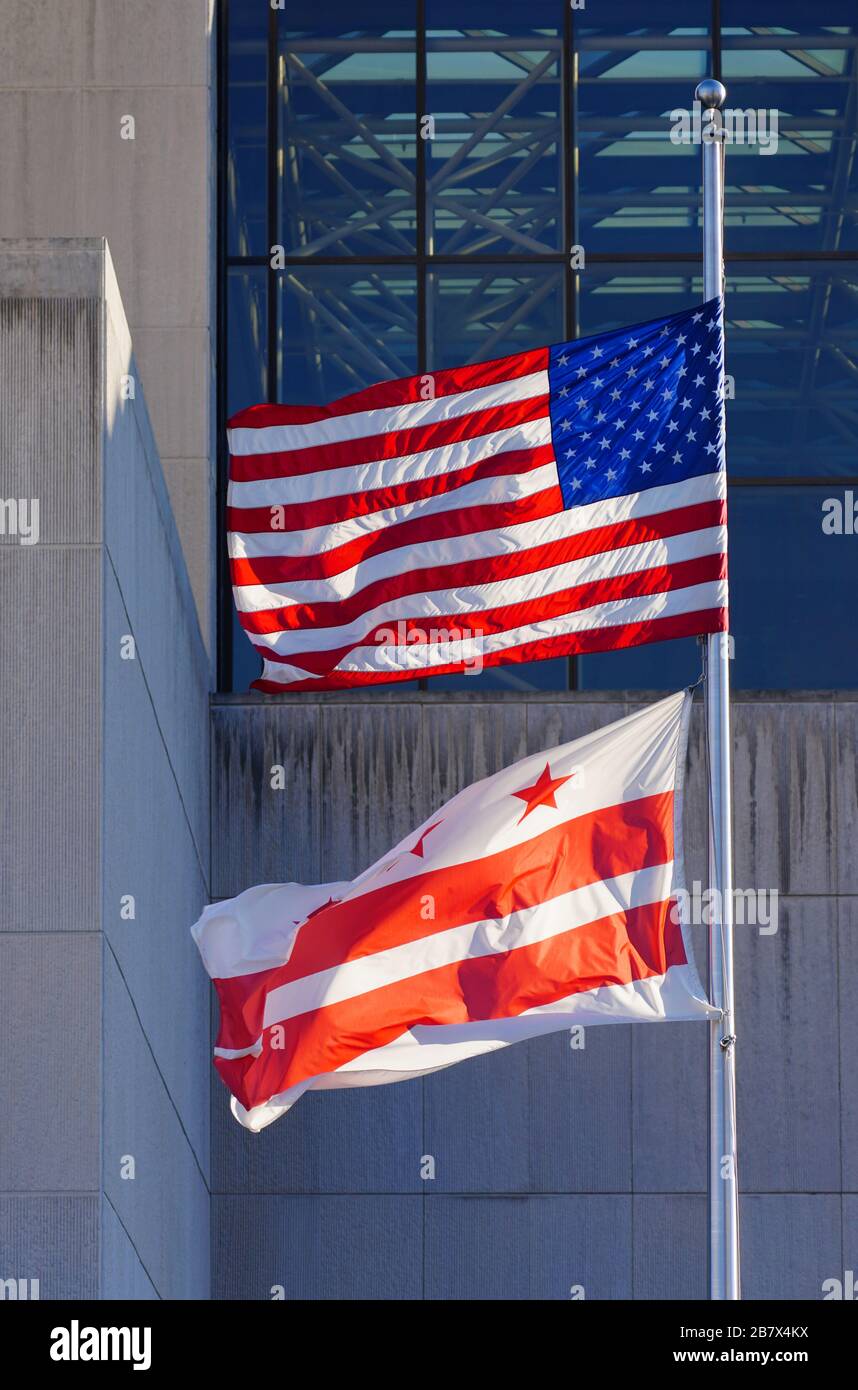 Flags of Washington DC and the United States floating side by side ...