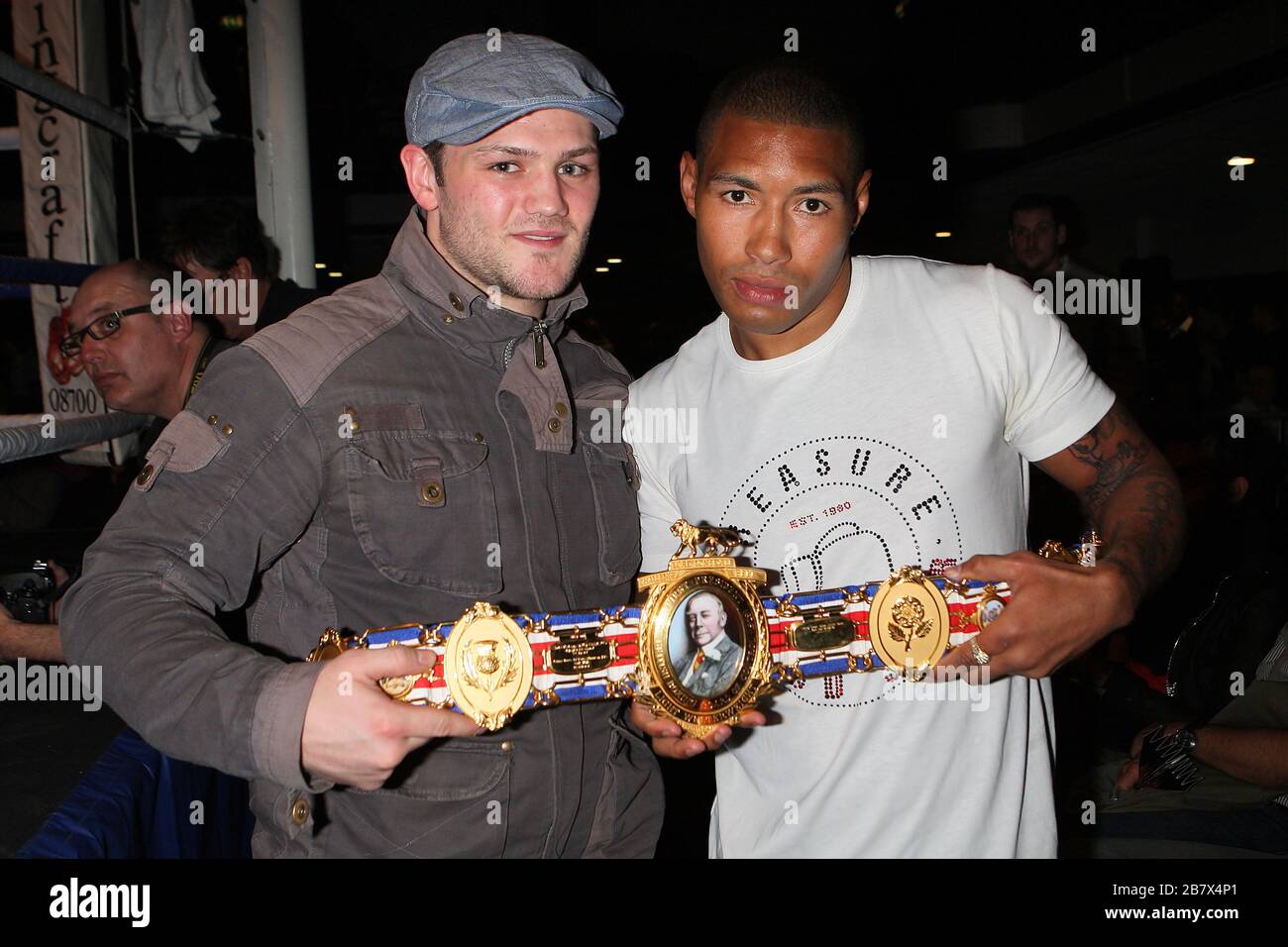 British LightWelterweight champion Ashley Theophane (R) and George ...