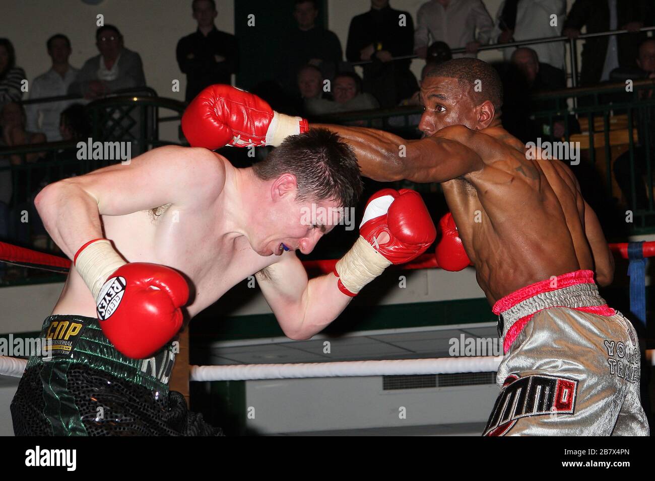 Darren Hamilton (silver/pink shorts) defeats Peter McDonagh in a ...