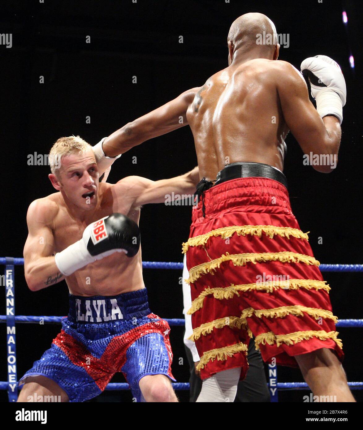 Gary Sykes (Dewsbury, blue shorts) defeats Harry Ramogoadi (Rugby, red ...