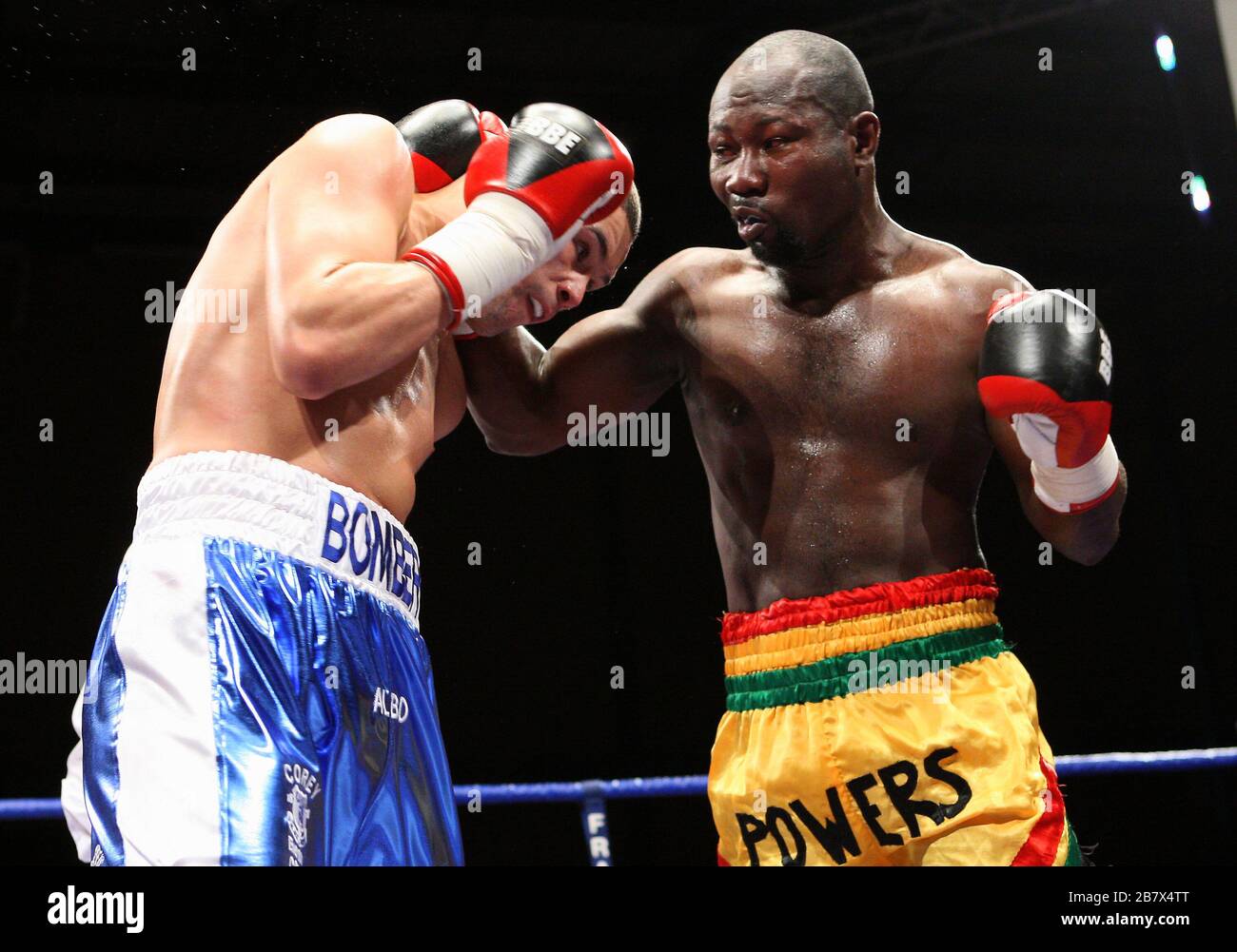 Tony Bellew (Liverpool, blue shorts) defeats Ayittey Powers (St Pancras ...