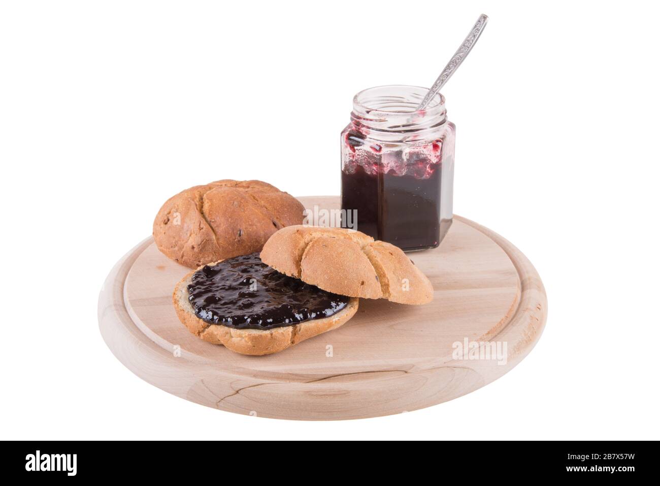 bread spread with jam arranged on kitchen board Stock Photo - Alamy