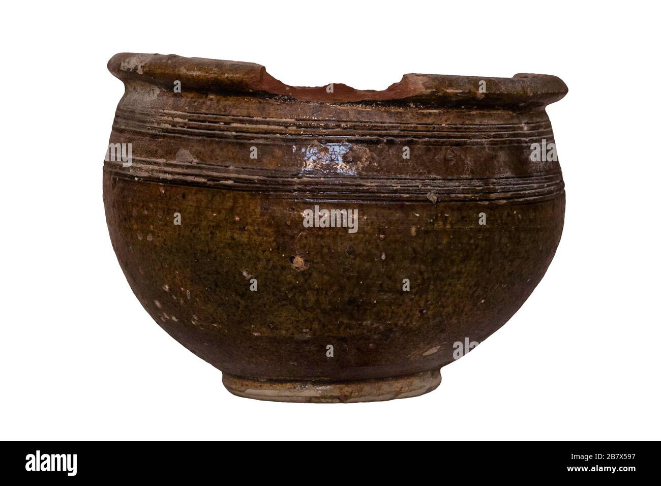 Old clay pot on a white background. The remains of the ancient Greek ...