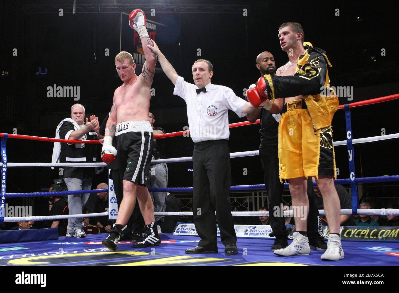 Tom Dallas (black shorts) defeats Paul Morris in a Heavyweight boxing ...