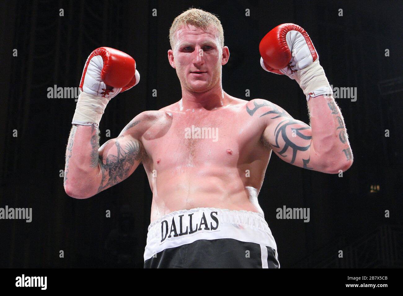 Tom Dallas (black shorts) defeats Paul Morris in a Heavyweight boxing ...