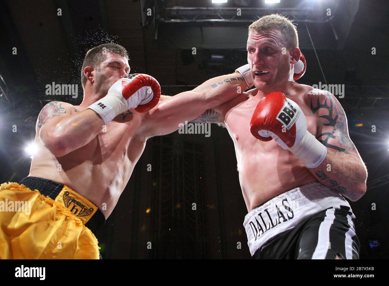Tom Dallas (black shorts) defeats Paul Morris in a Heavyweight boxing ...