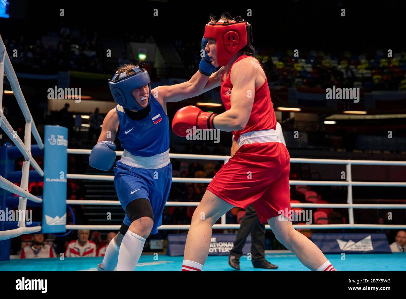 London, UK. 15-03-20. Rosie Eccles (GBR) RED fights Saadat Dalgatova ...