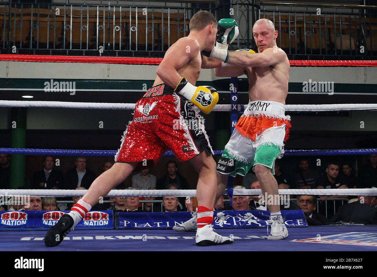 Billy Joe Saunders (red shorts) defeats Tommy Tolan in a Middleweight ...