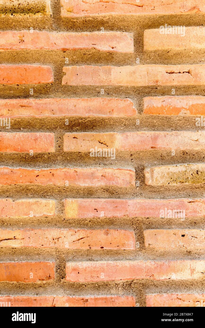 Vertical Shot of Textured Brick Wall Background Stock Photo - Alamy