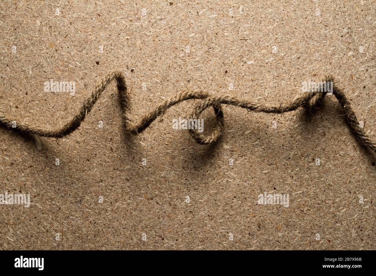 Tangled rope. Jute cable background Stock Photo - Alamy
