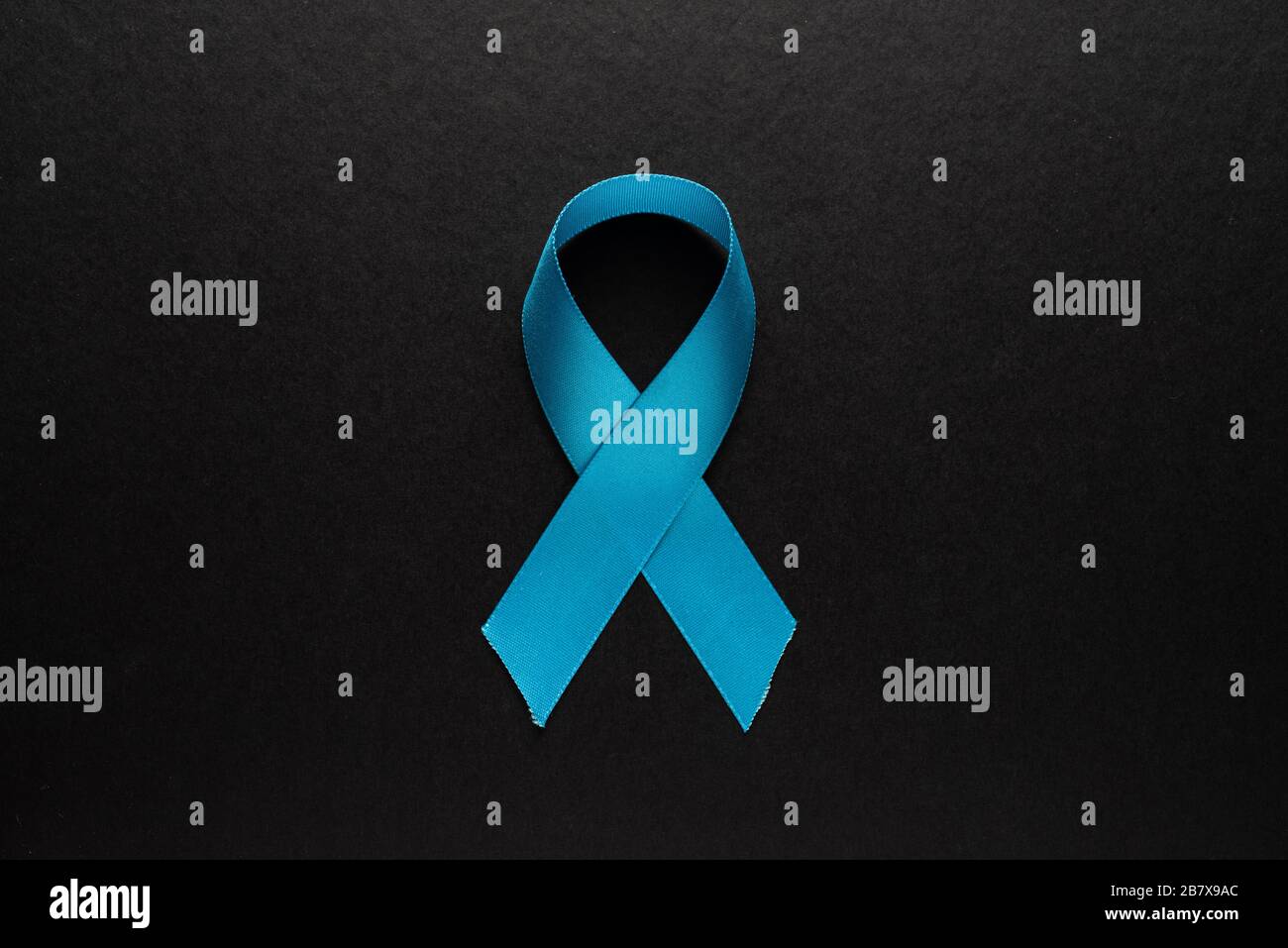 Blue Awareness Ribbon on Black Stock Photo - Alamy