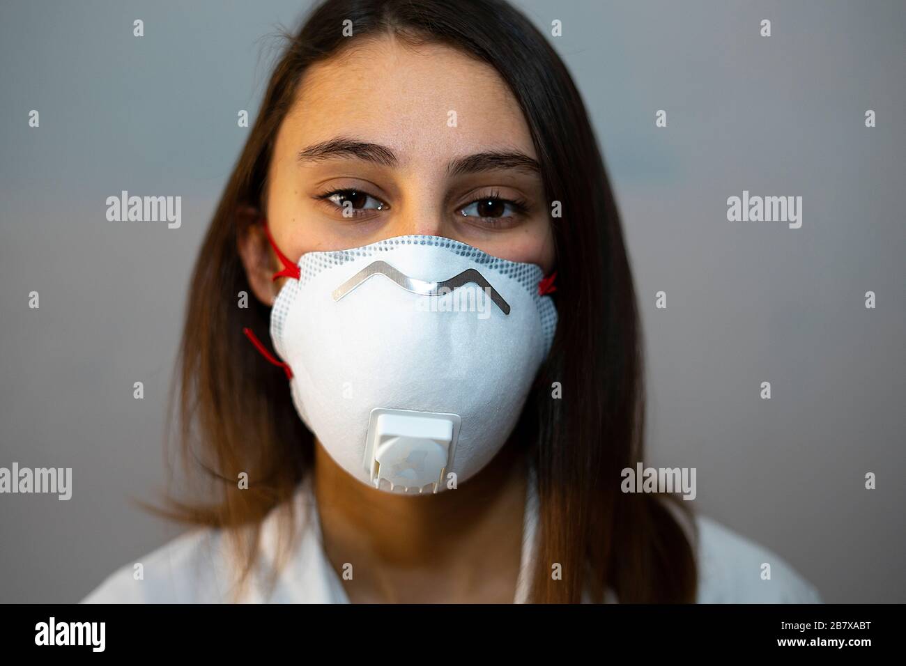 Female doctor with a doctor mask. Breathing medical respiratory mask ...