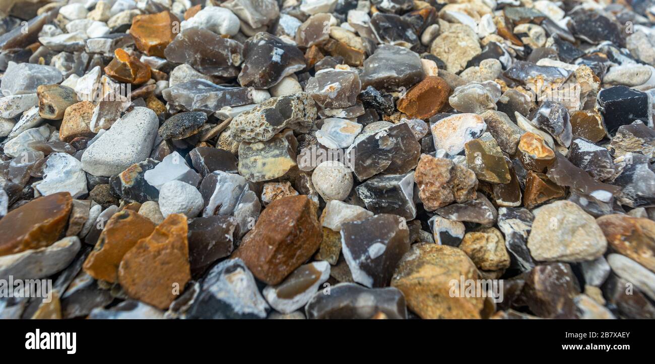 sea stones of different sizes close up Stock Photo - Alamy