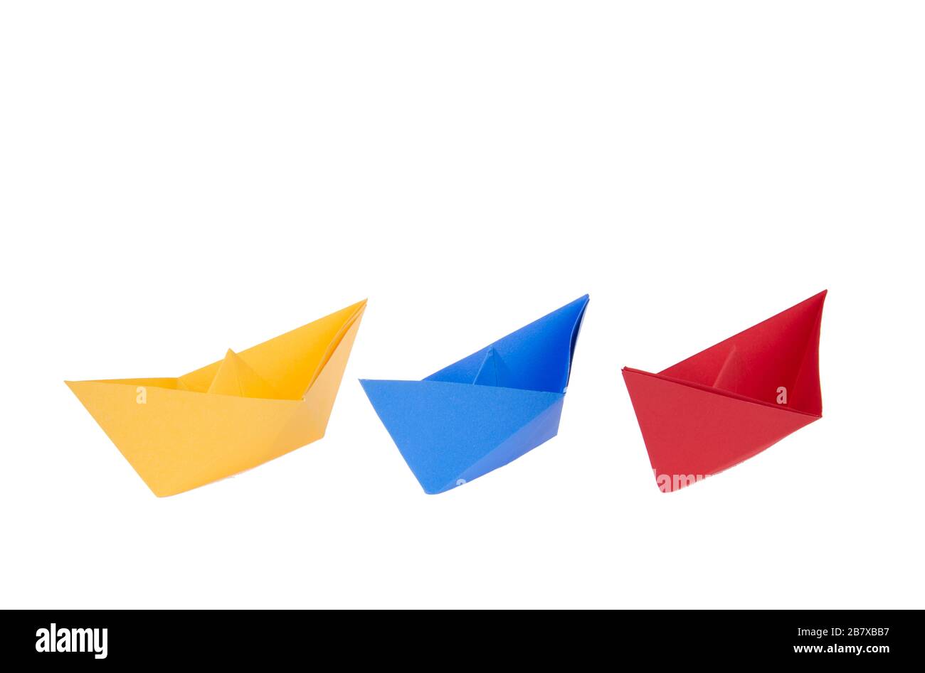 isolated in white boats made ??of folded colored paper Stock Photo - Alamy