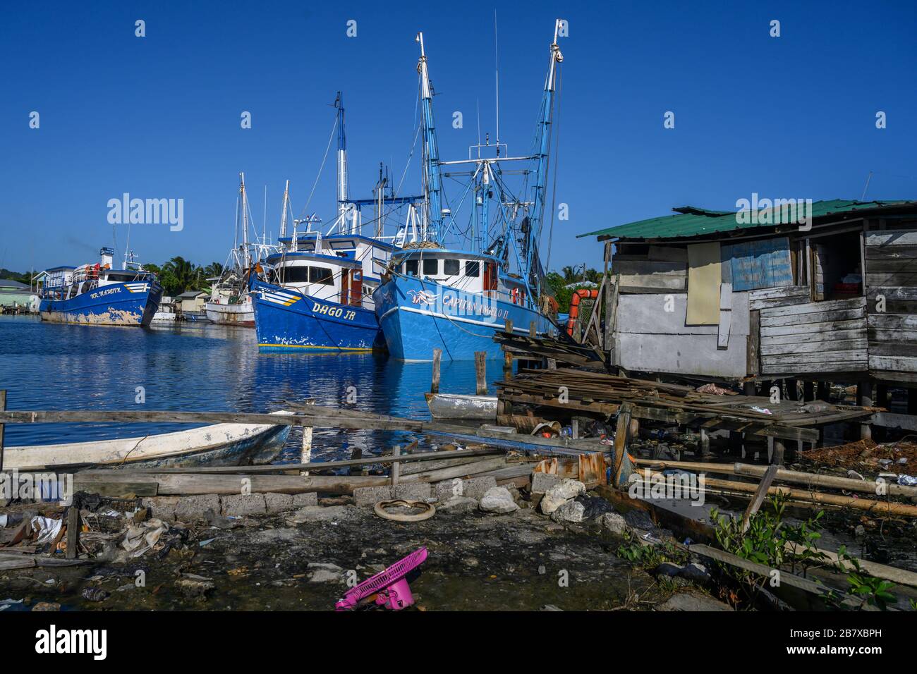 Fishing boats moored at French Harbour, Roatan, Honduras Stock Photo ...
