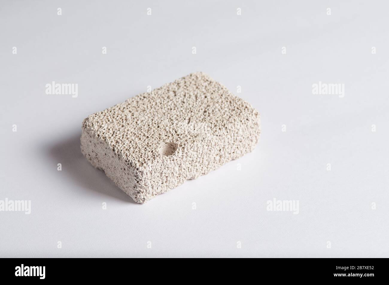 Crafted Gray pumice natural volcanic stone isolated on white background ...