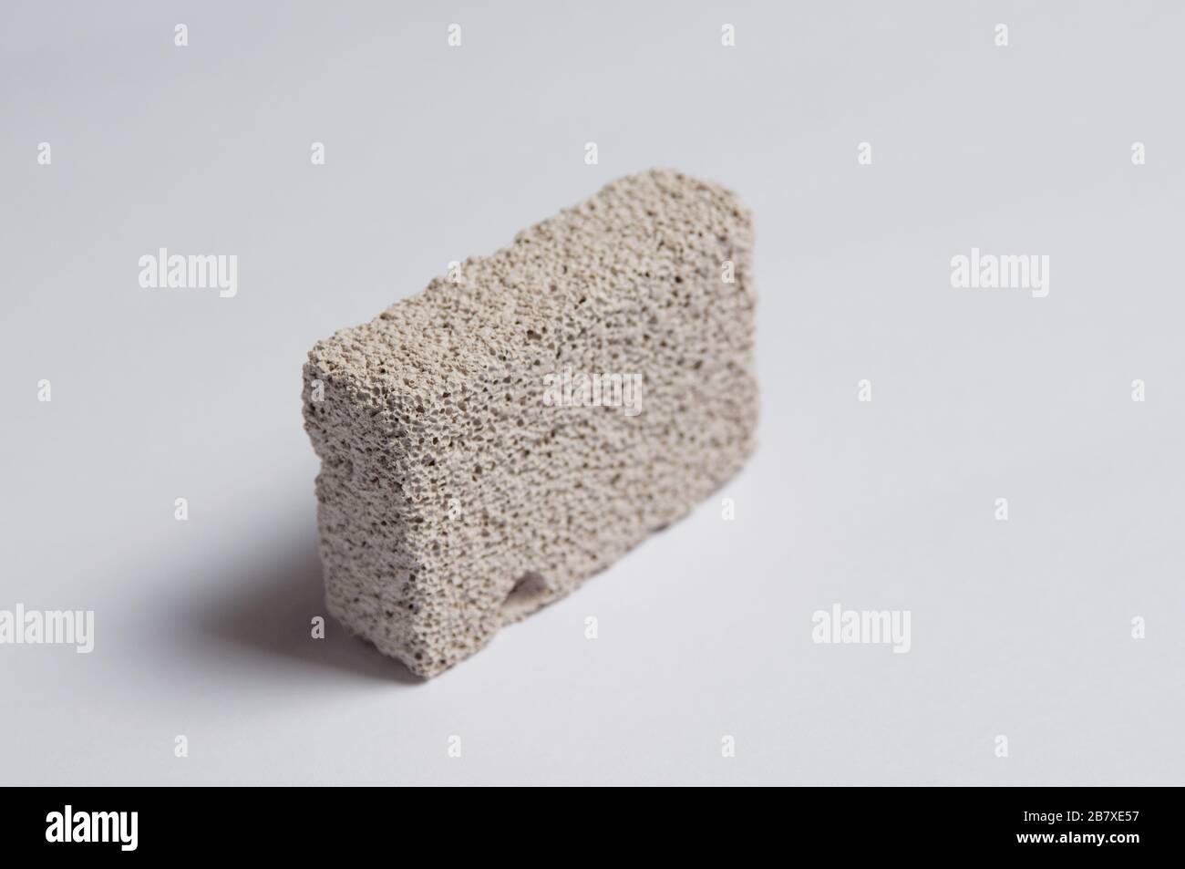 Crafted Gray pumice natural volcanic stone isolated on white background ...