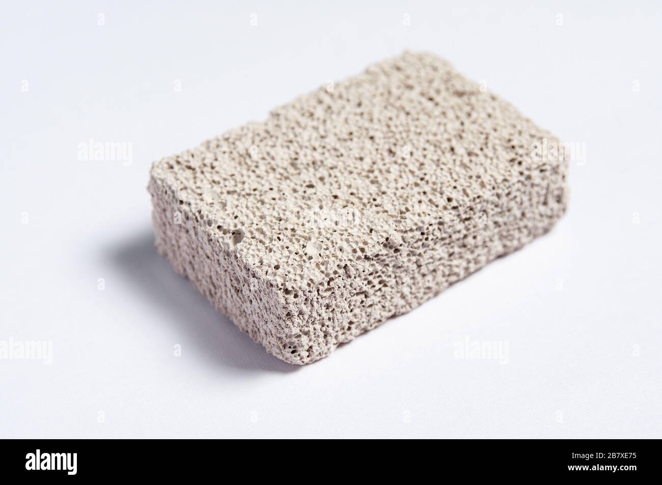 Crafted Gray pumice natural volcanic stone isolated on white background ...