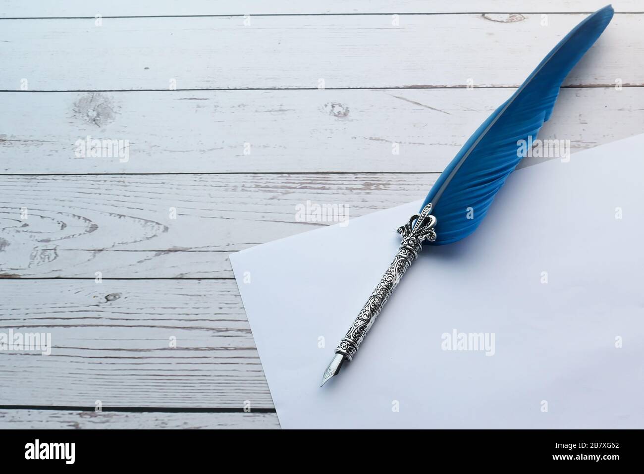 Old fountain pen and paper on white background Stock Photo - Alamy