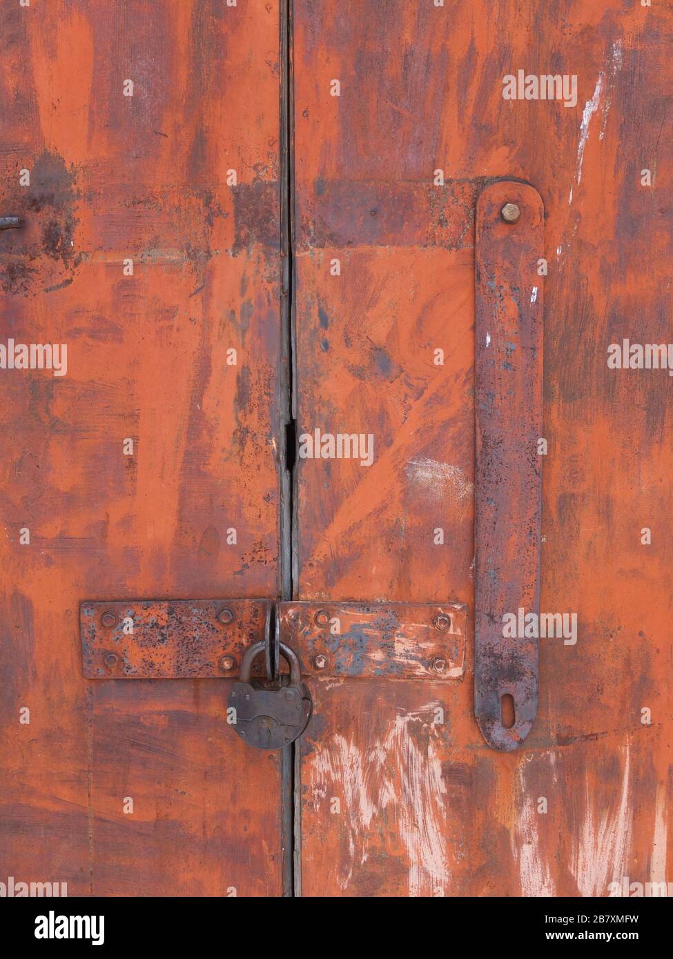 Old rusty iron gates with a big padlock Stock Photo - Alamy