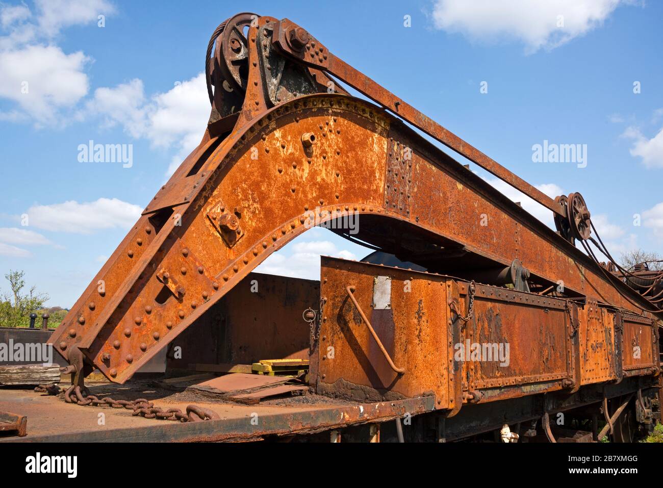 A rusty crane awaiting restoration in the sidings next to the engine ...
