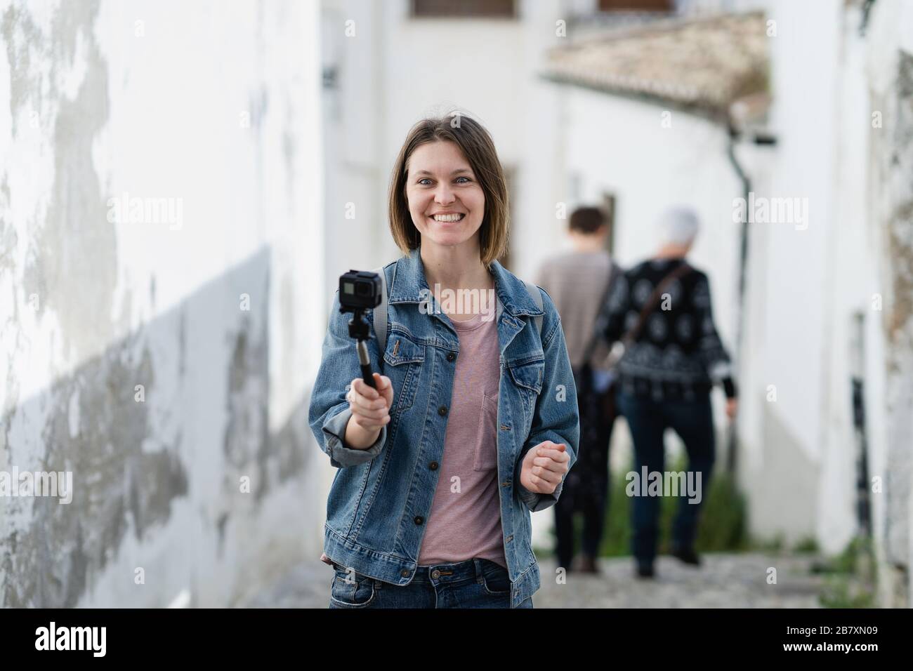 Woman girl filming movie camera hi-res stock photography and images - Alamy
