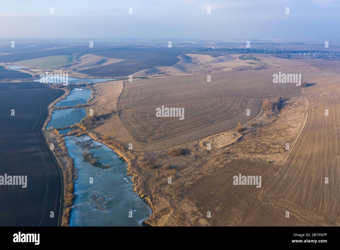 Drone shooting over freezing lake hi-res stock photography and images ...