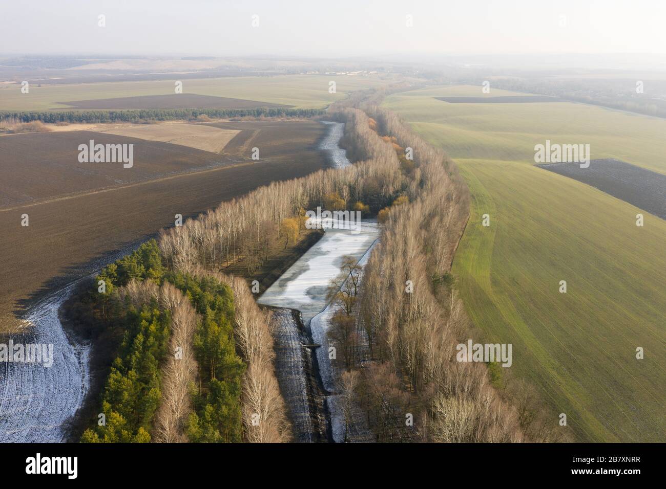 Trees surrounded the lake, which was built by people. Pictured is the ...
