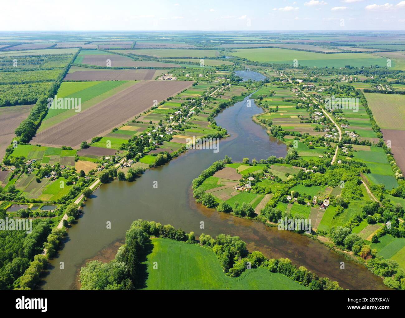 Beautiful landscape from the sky. The river is divided into two streams ...