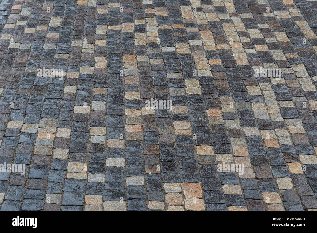 Ancient paving stones made of rectangular stone bricks. Textured ...