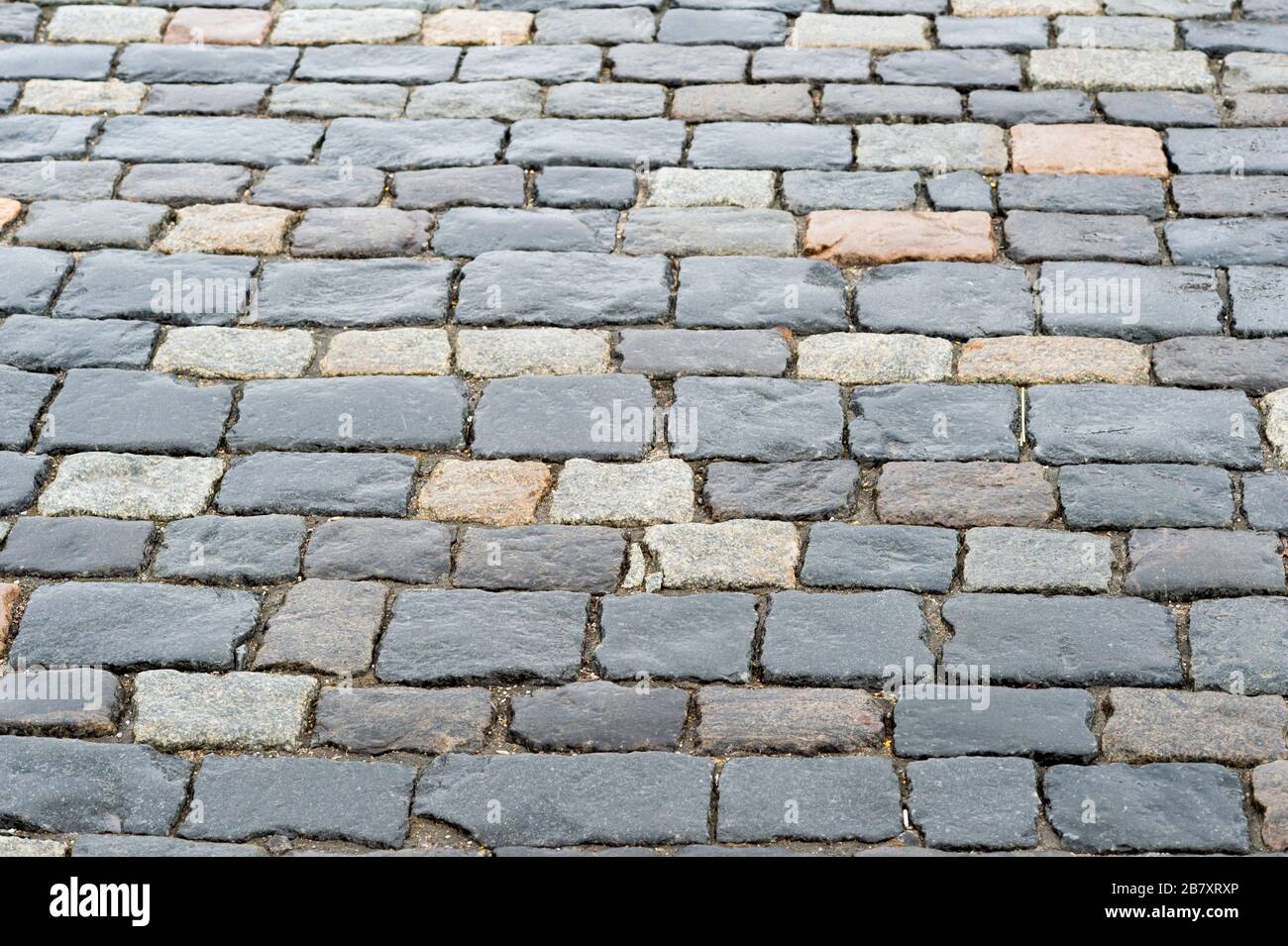 Old paving stones close- up of rectangular stone bricks. Textured ...