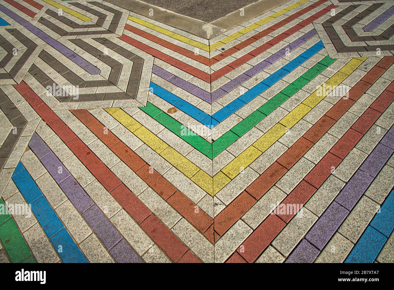 Close up view of colorful pavement stone walkway background. Colorful ...