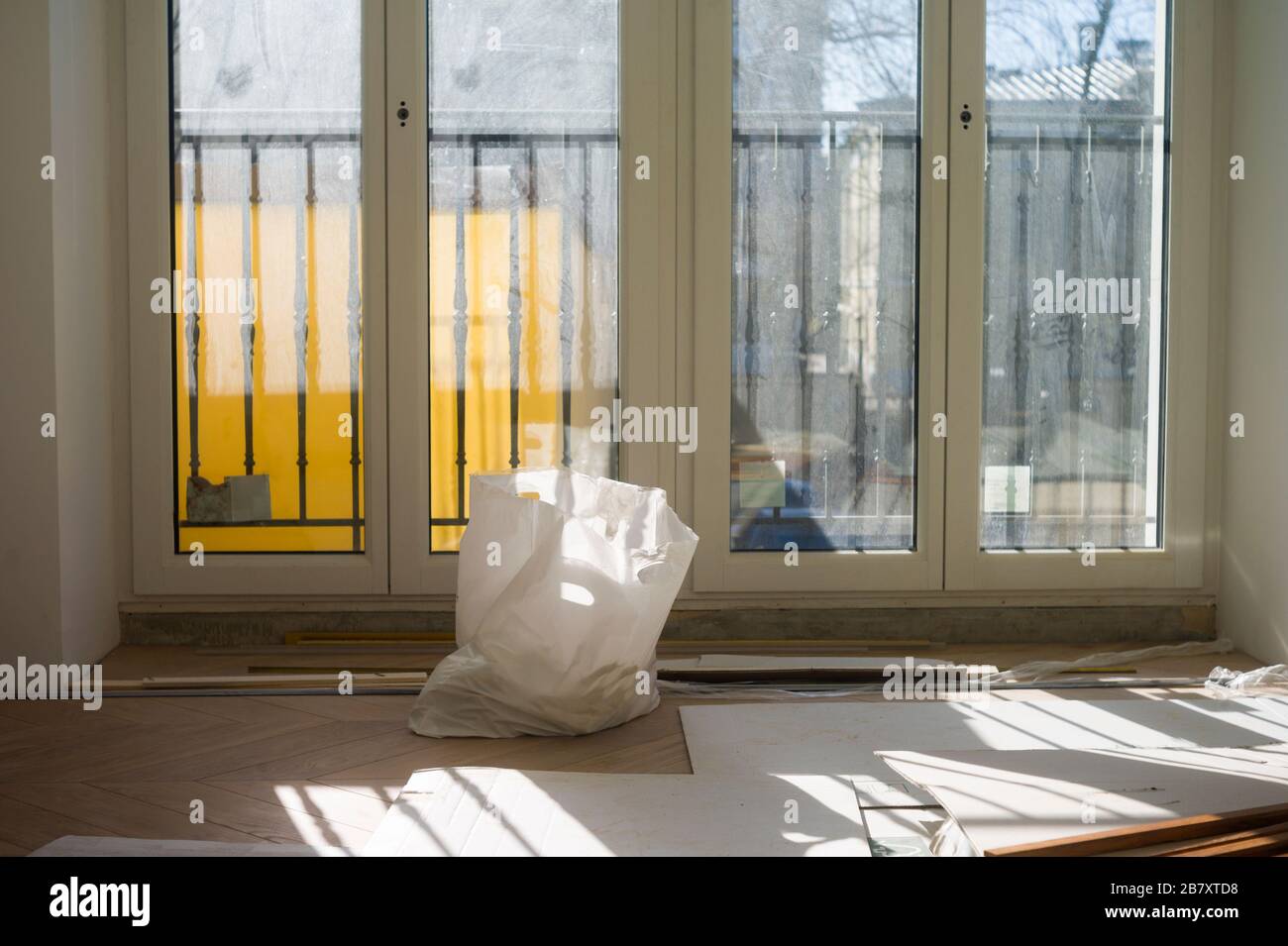 A sack for garbage in a room under renovation, indoor shot Stock Photo ...
