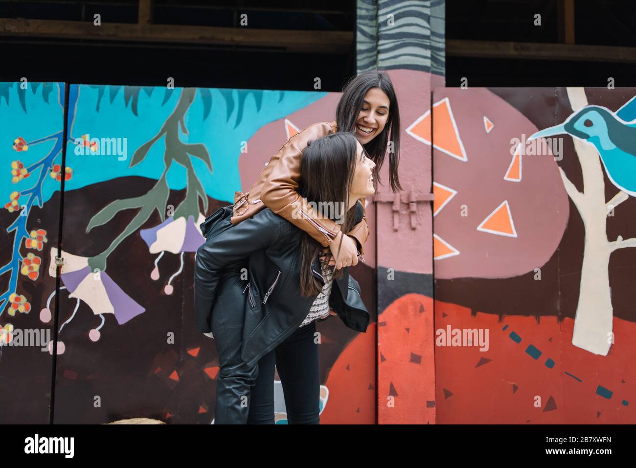 Piggy back sisters hi-res stock photography and images - Alamy