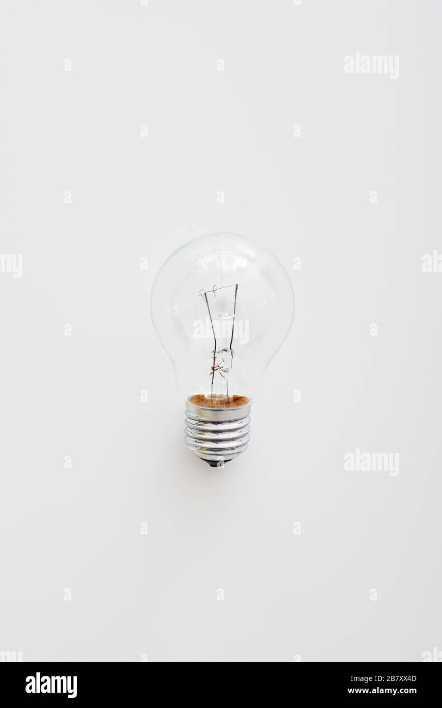 Typical incandescent light bulb in off-state, isolated on white ...
