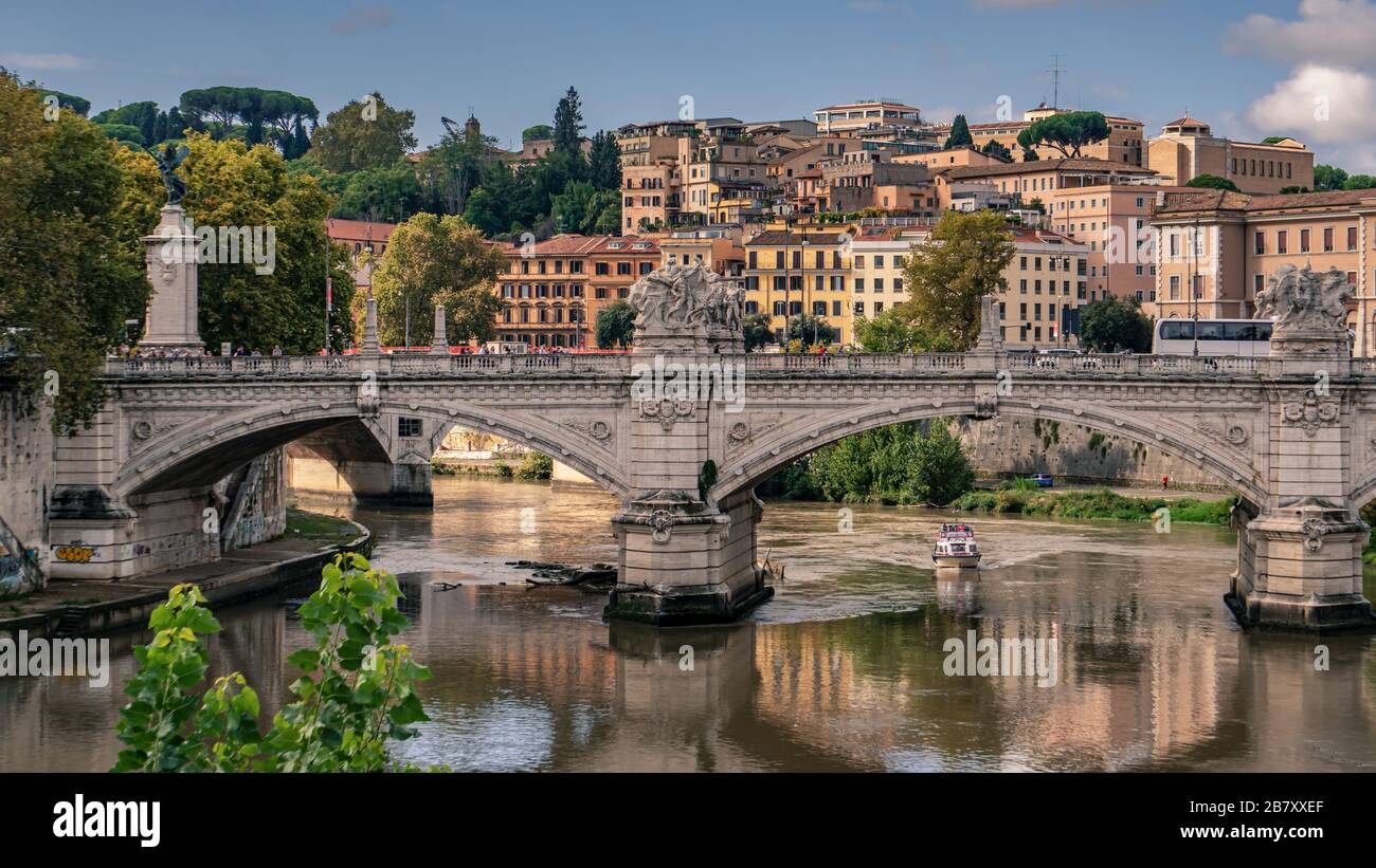 A bridge over the Tiber River near St. Peter's Basilica and the Vatican ...