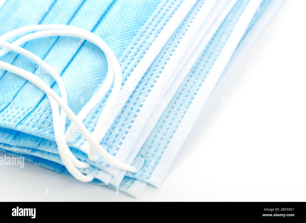 Group of blue medical mask for protection against coronavirus and other ...