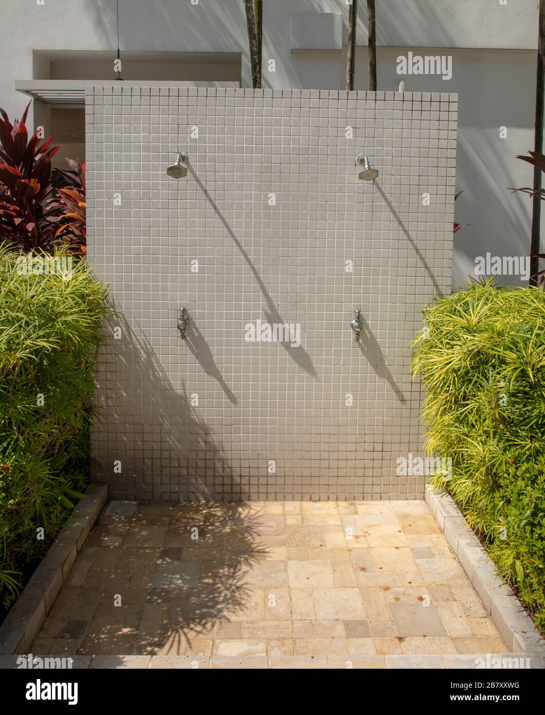 Outdoor shower space and attachments seen in a garden Stock Photo - Alamy