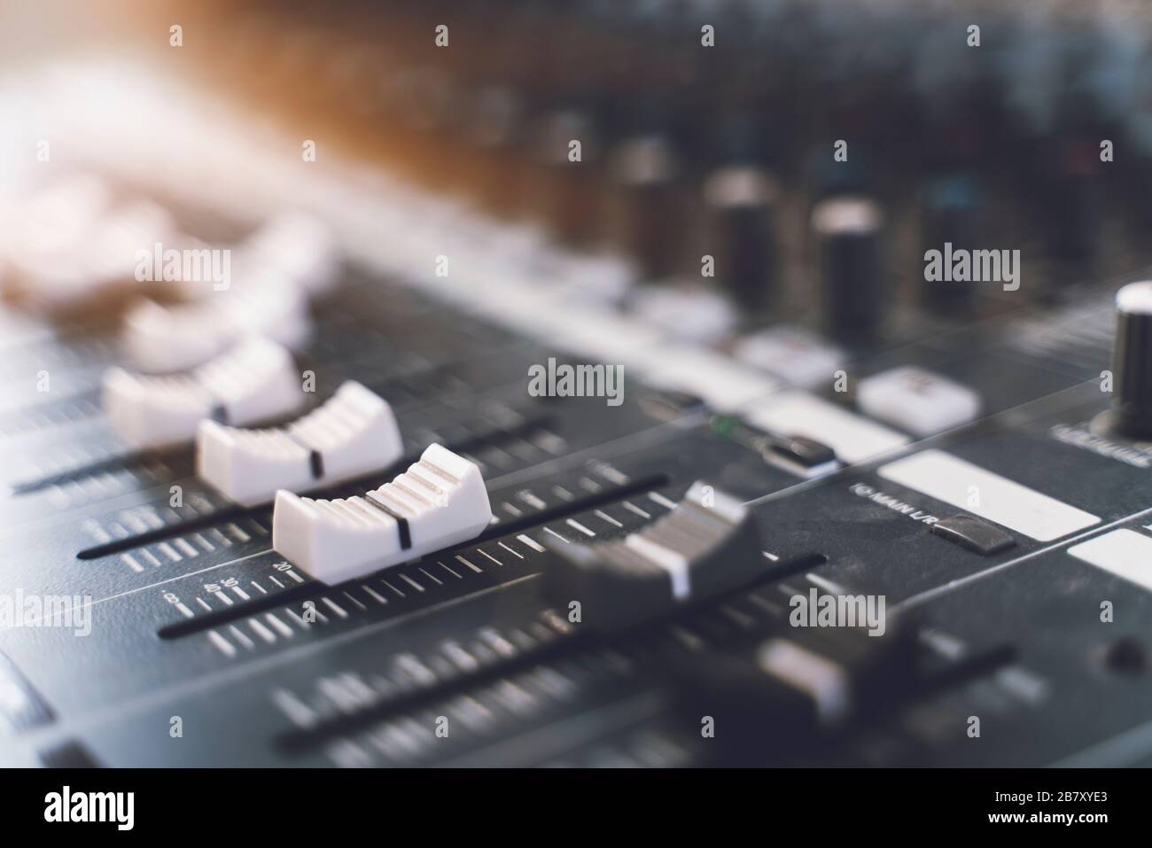 Sound mixer. Professional audio mixing console with lights, buttons ...