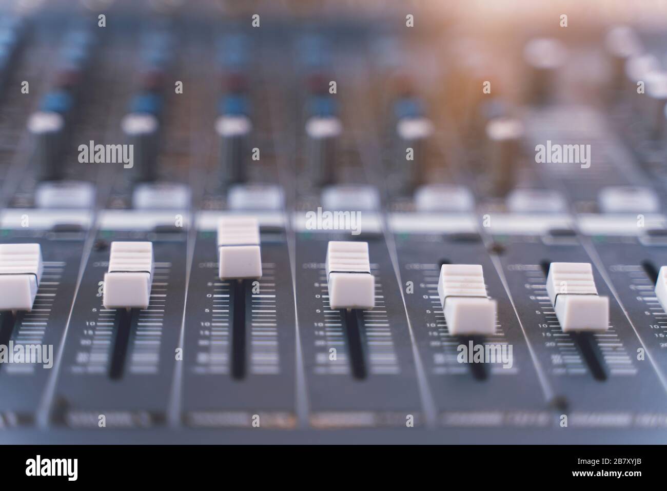 Sound mixer. Professional audio mixing console with lights, buttons ...