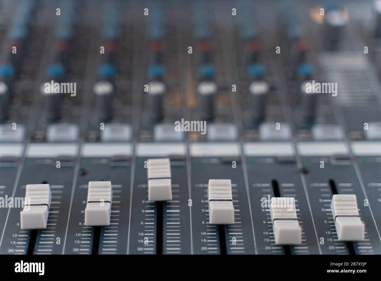 Sound mixer. Professional audio mixing console with lights, buttons ...