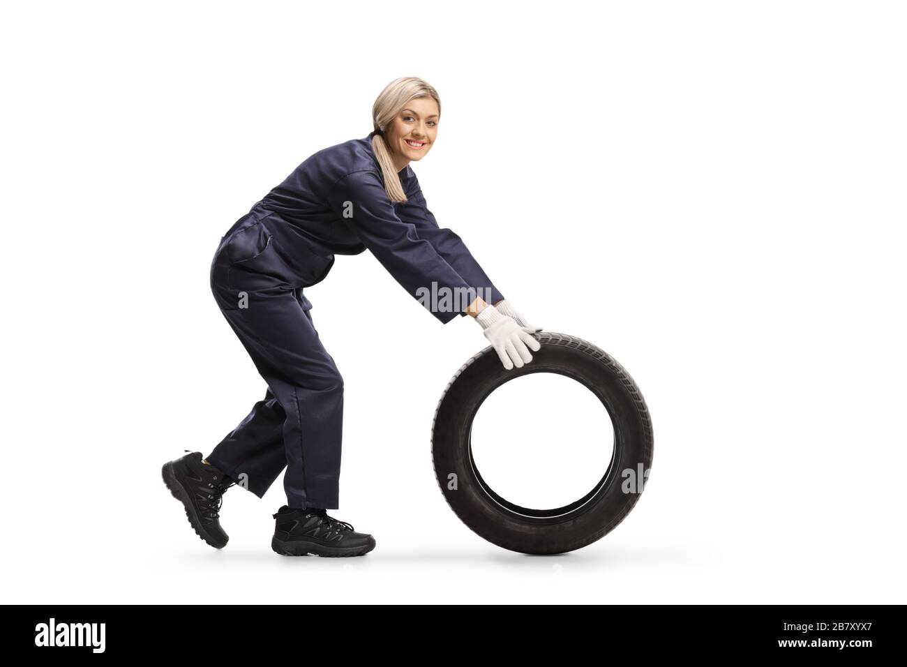Rolling a tire hi-res stock photography and images - Alamy