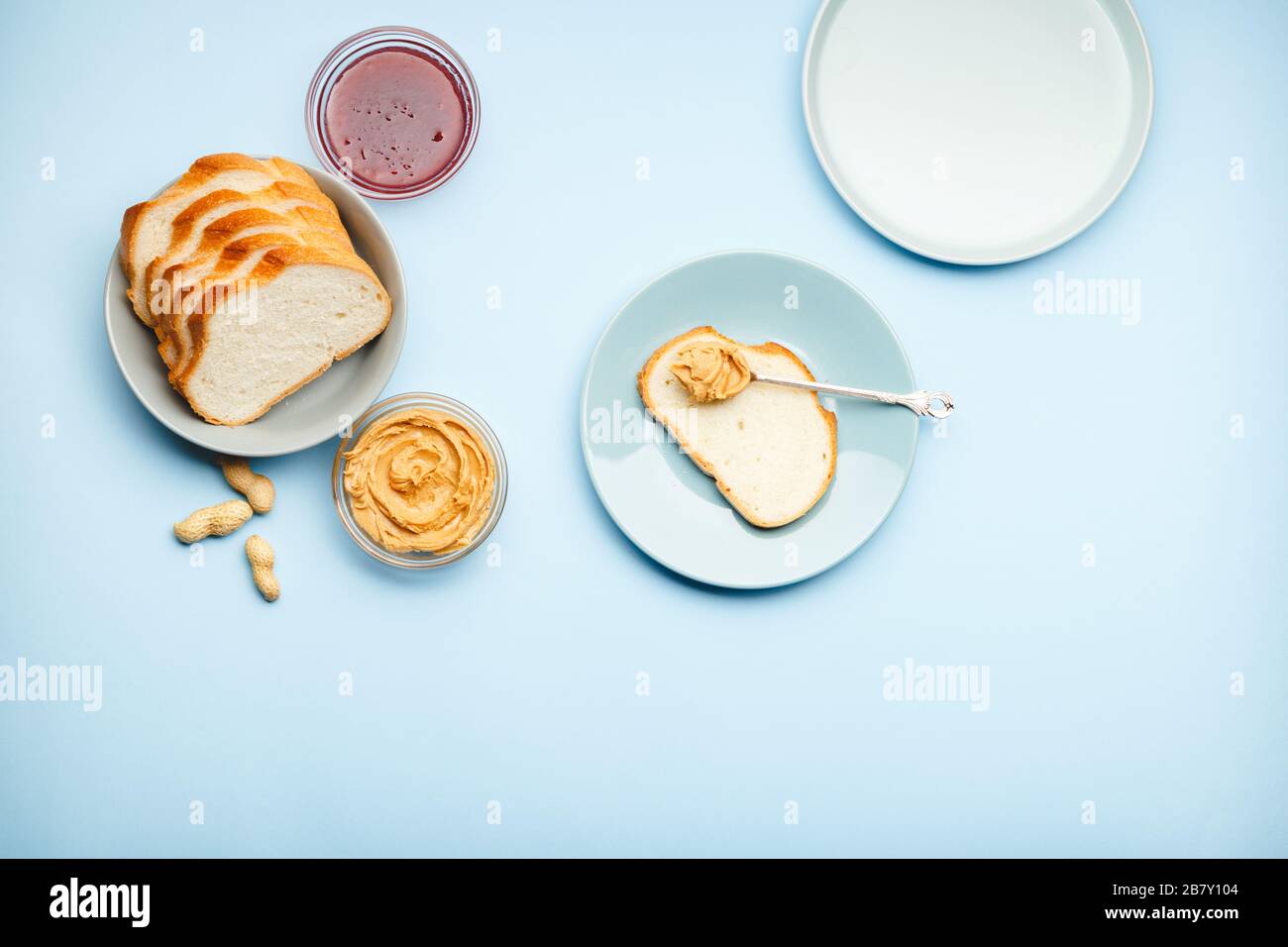 Top view,flat lay process of cooking breakfast, spreading bread, toast ...