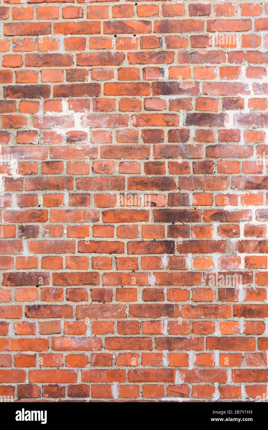 Old messy brick wall texture background exterior Stock Photo - Alamy