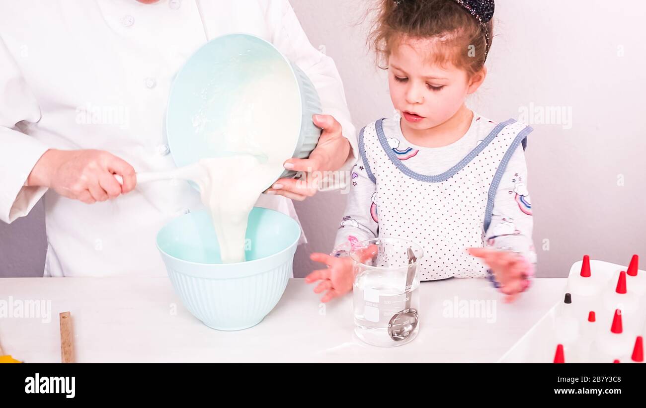 Step by step. Mixing royal icing to decorate sugar cookies Stock Photo ...