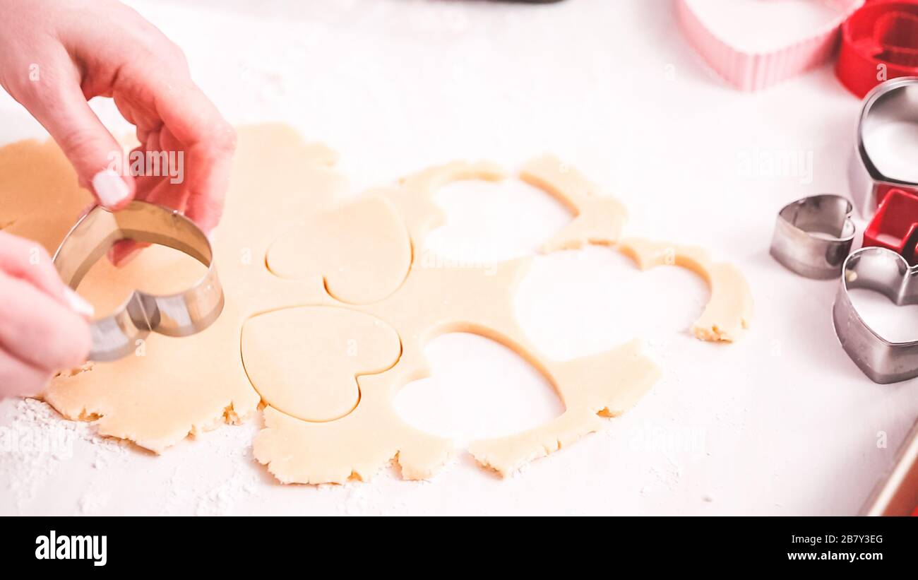 Step by step. Cutting out shapes from sugar cookie dough with cookie ...