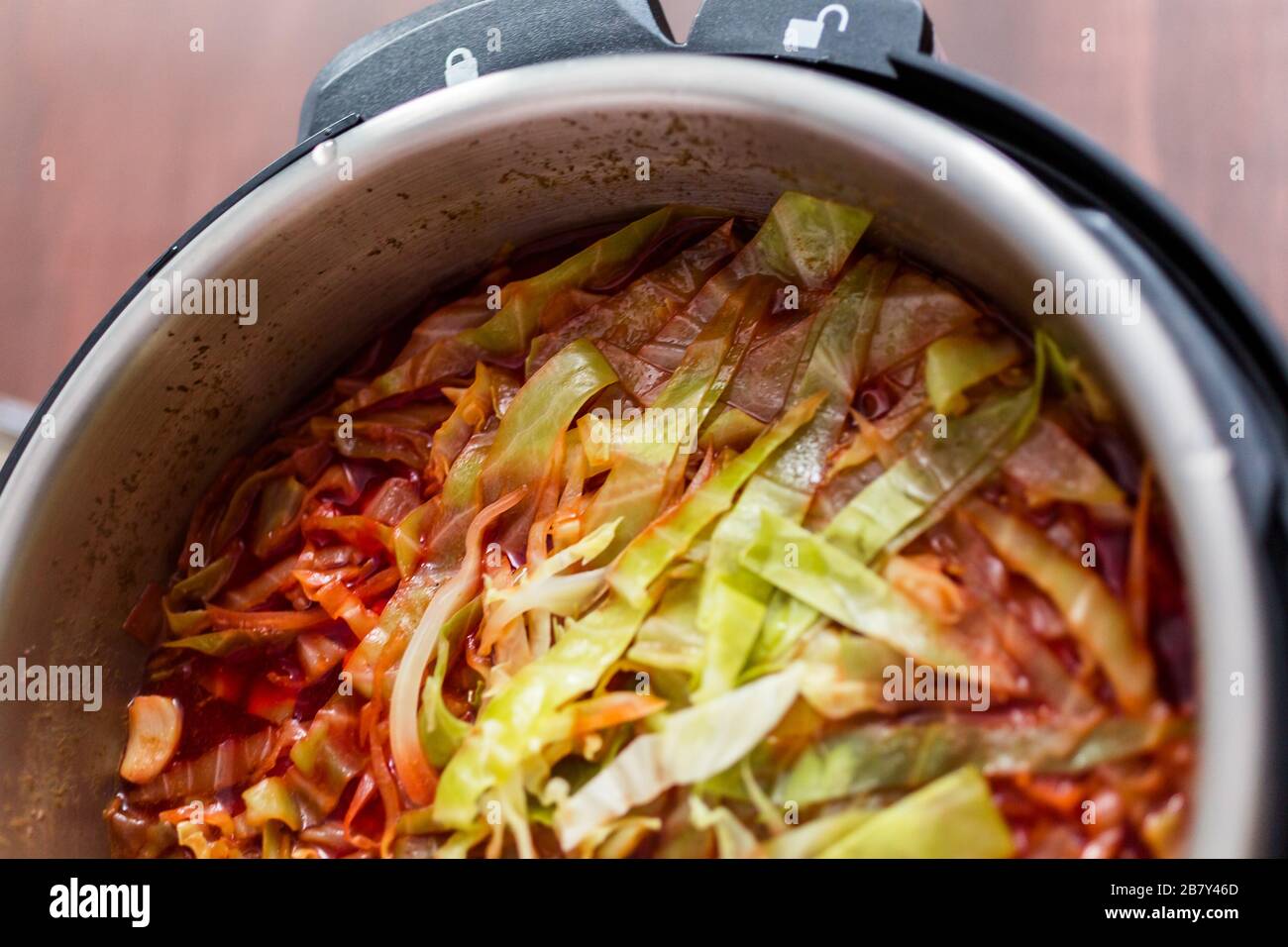 Cooking borscht in electric multi cooker Stock Photo - Alamy