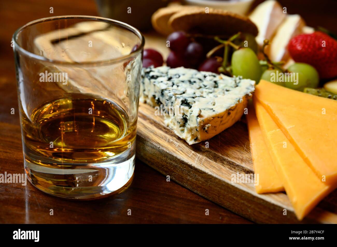 Tasting of original scottish cheese and whisky, plate with scottish ...