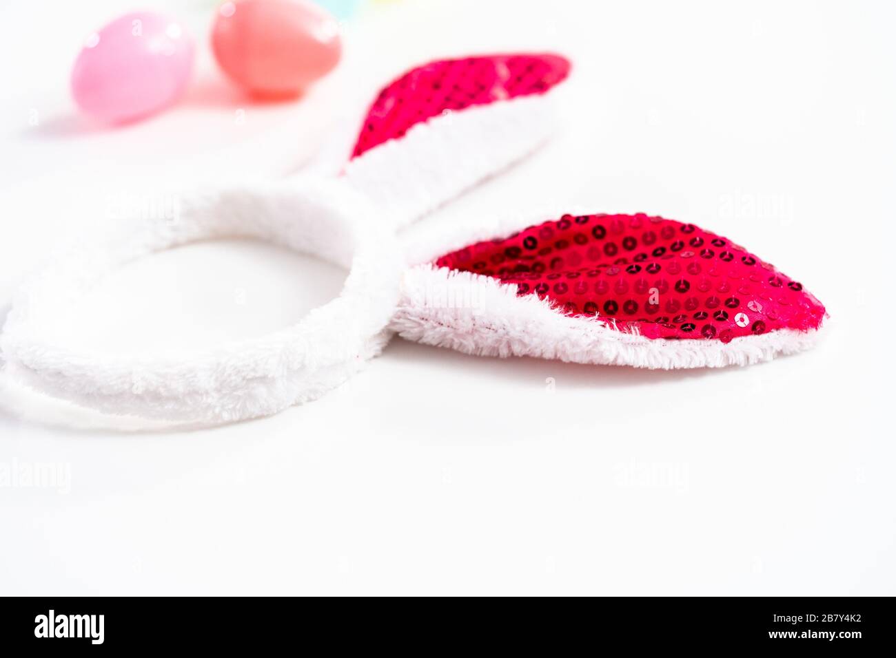 Easter bunny ears headband on a white background Stock Photo - Alamy