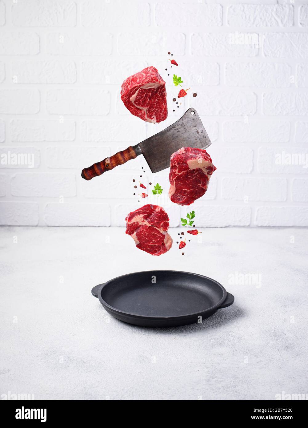 Raw marbled ribeye steak. Food levitation Stock Photo - Alamy